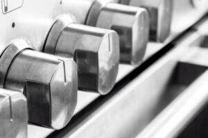 American Metal Finishing | Anodizing | Custom Rack Design | Masking